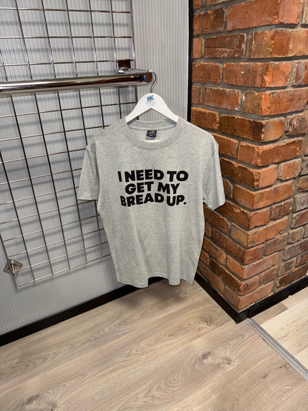 Corteiz “I Need To Get My Bread Up.” Grey Tee – Caught Drip'N'